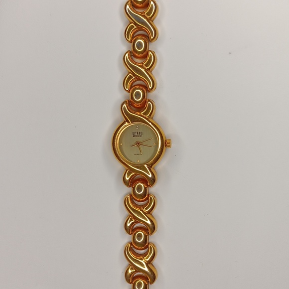 Gitano | Accessories | Vintage 8s Gitano 2000s Quartz Crescent Abstract ...